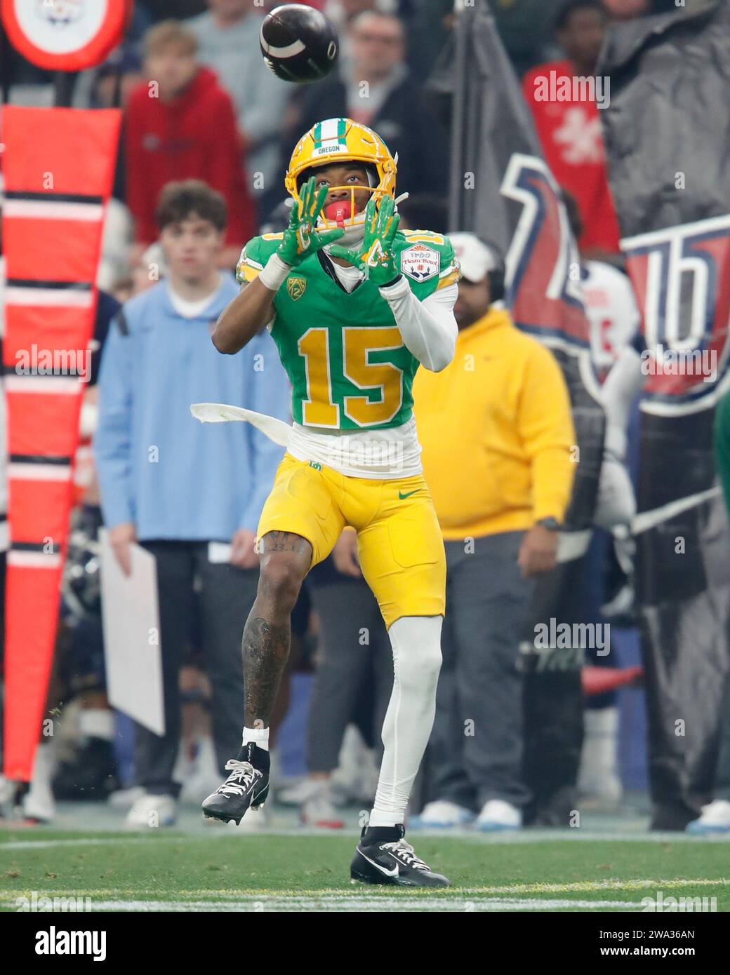 Glendale, Arizona, USA. 1st Jan, 2024. Tez Johnson (15) of the Oregon ...