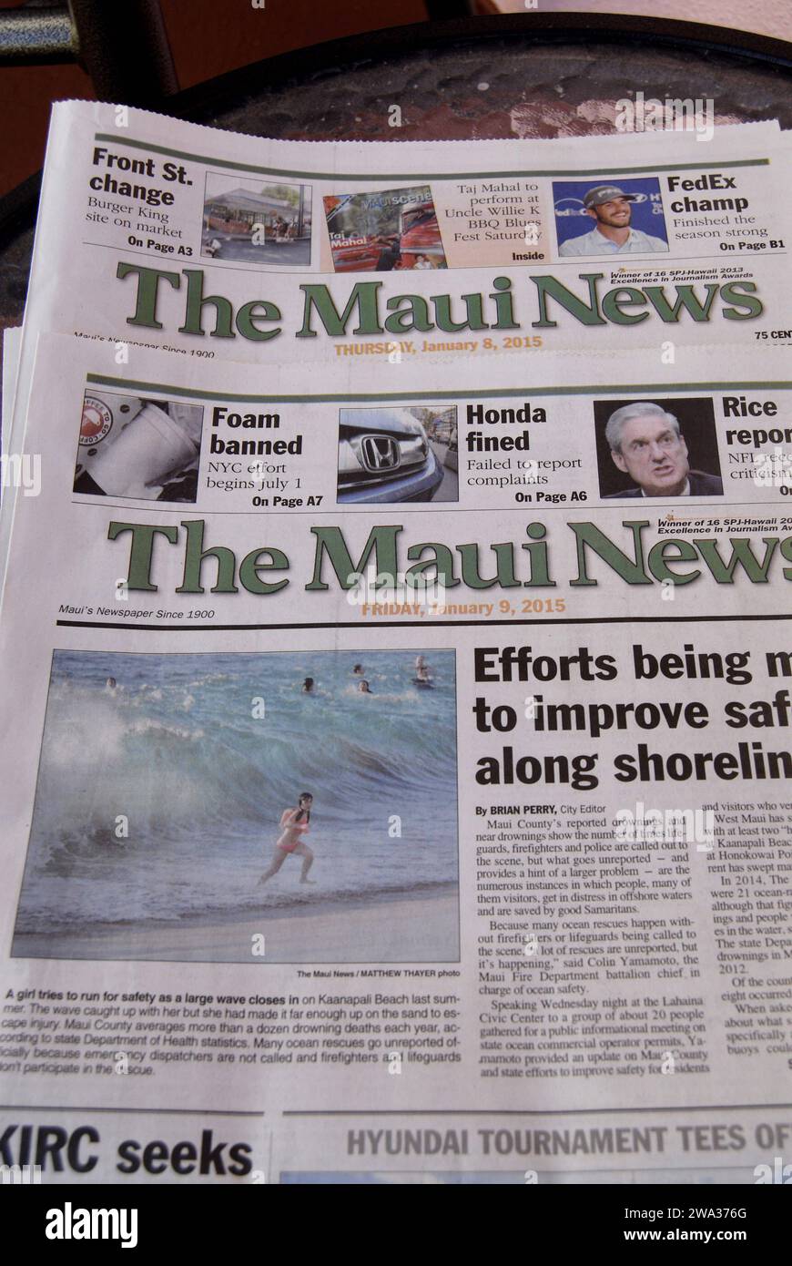 Maui .Hawaii islands ,USA The peron reading The maui News papers on ...