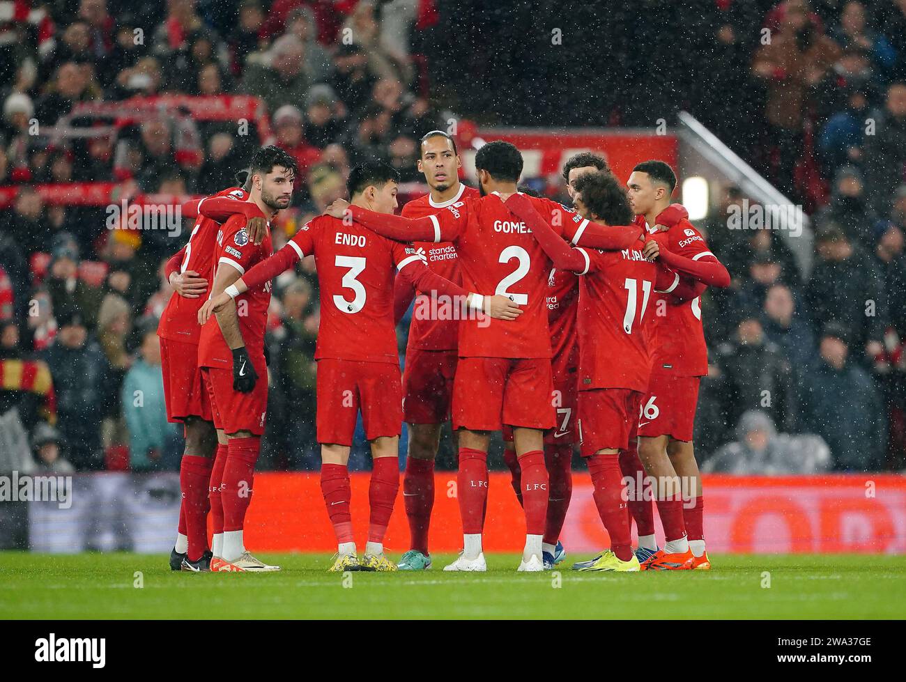 Liverpool players have a team huddle during the Premier League match at ...