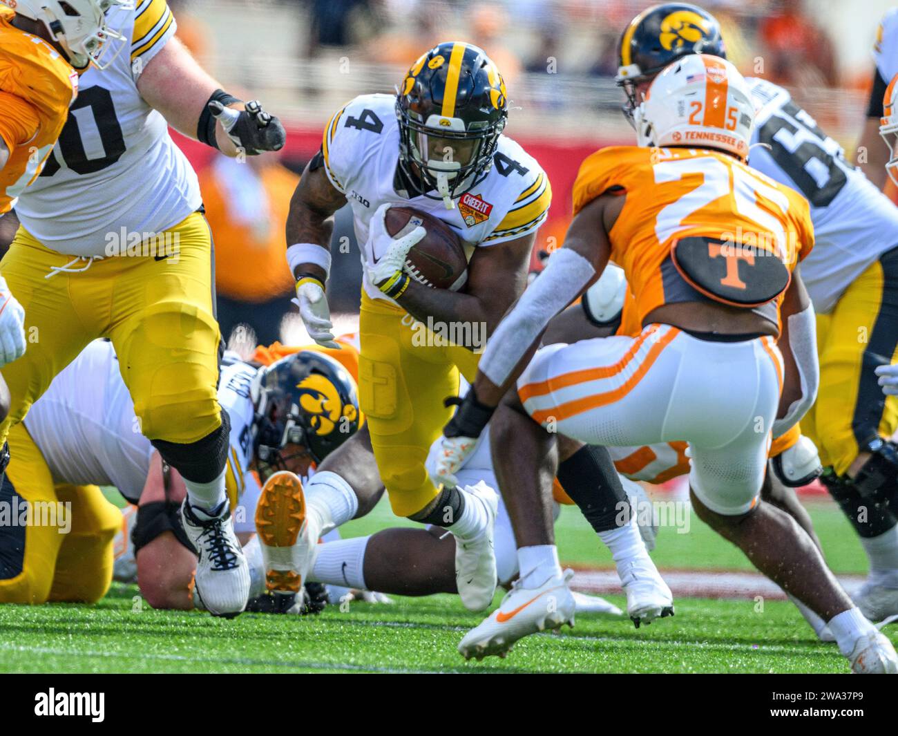 January 1, 2024: Iowa running back Leshon Williams (4) runs with the ...