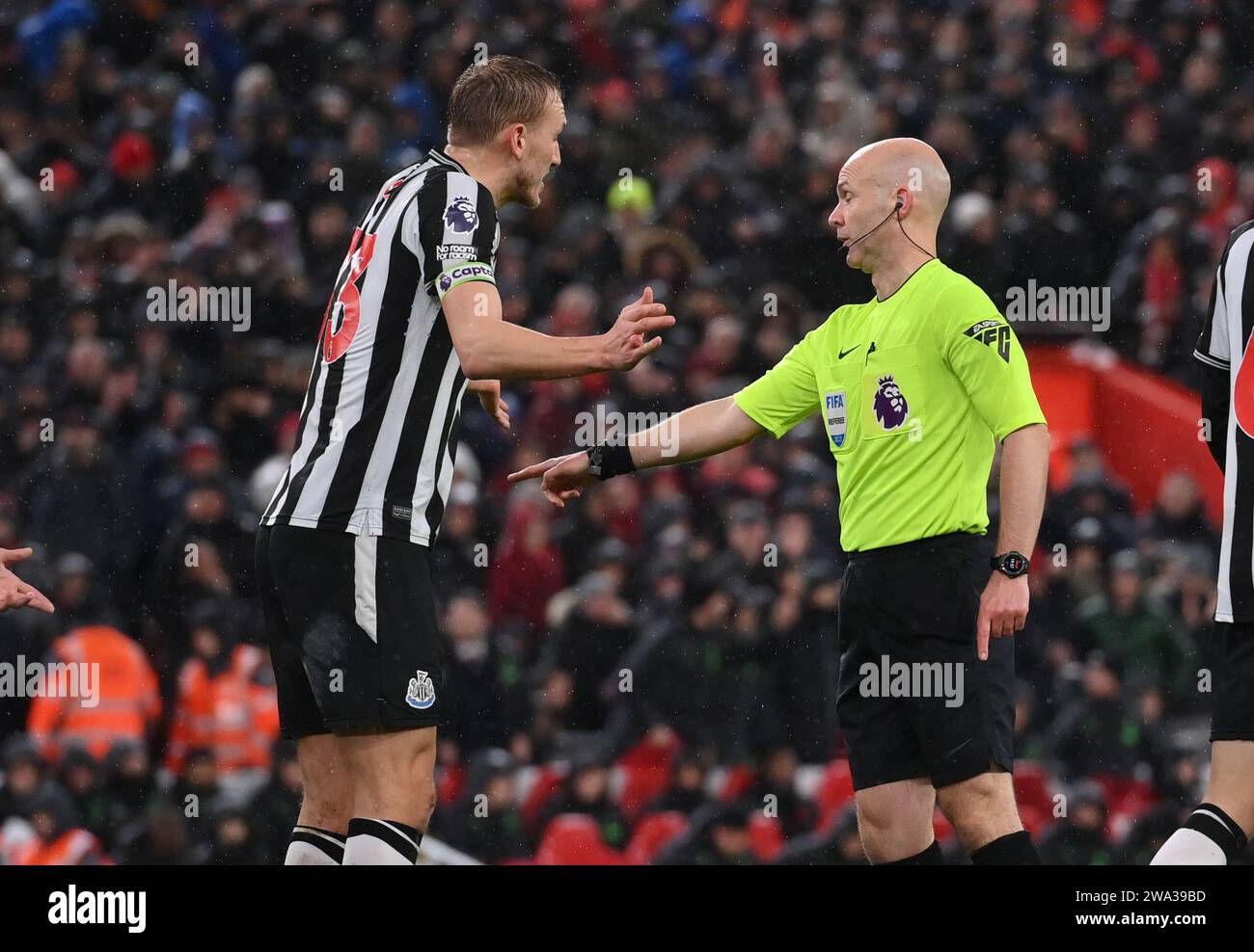Liverpool, UK. 1st Jan, 2024. Referee Anthony Taylor points to the ...