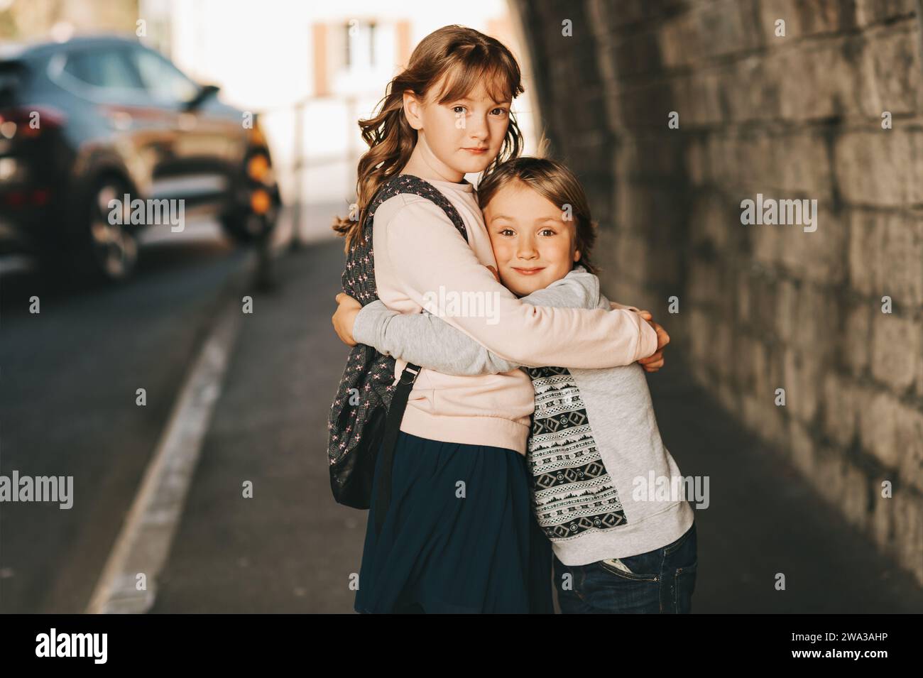 Outdoor portrait of two funny kids, little boy and girl Stock Photo - Alamy