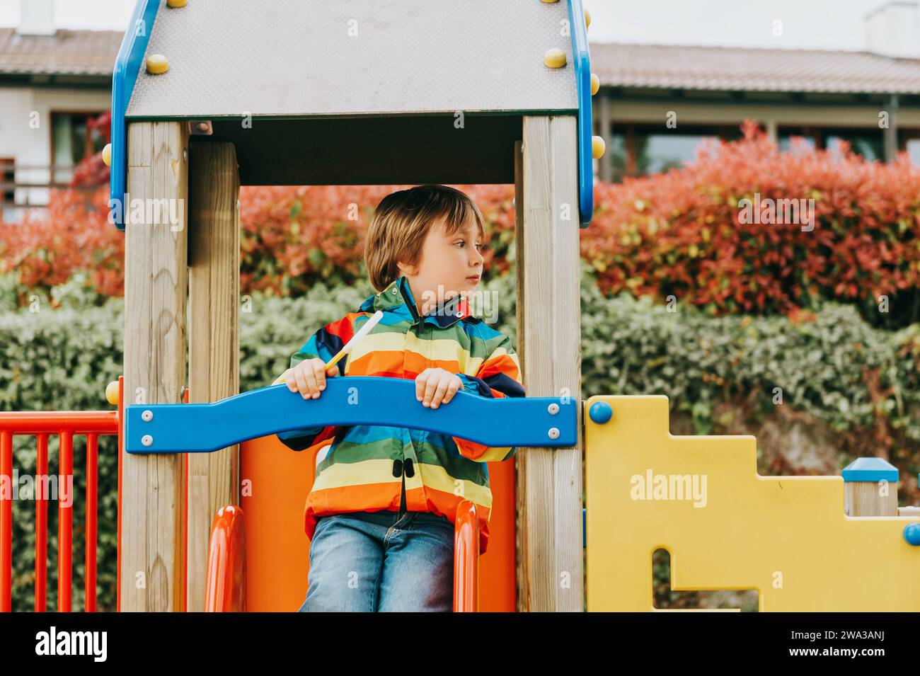 Cute little boy having fun on playground Stock Photo - Alamy