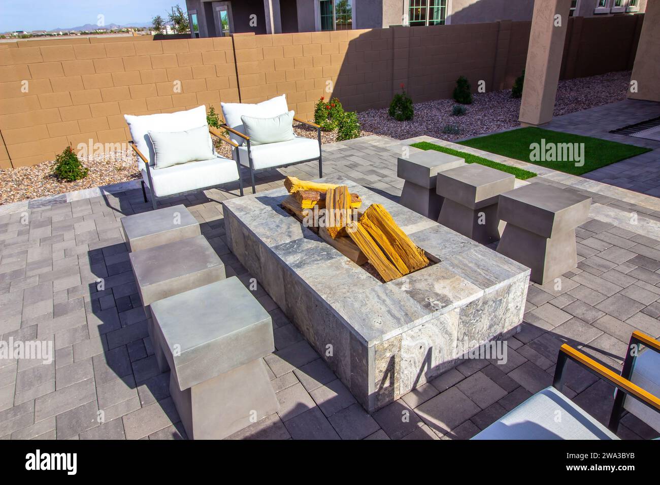 Rear Yard Conversation Area With Fire Pit Stock Photo - Alamy