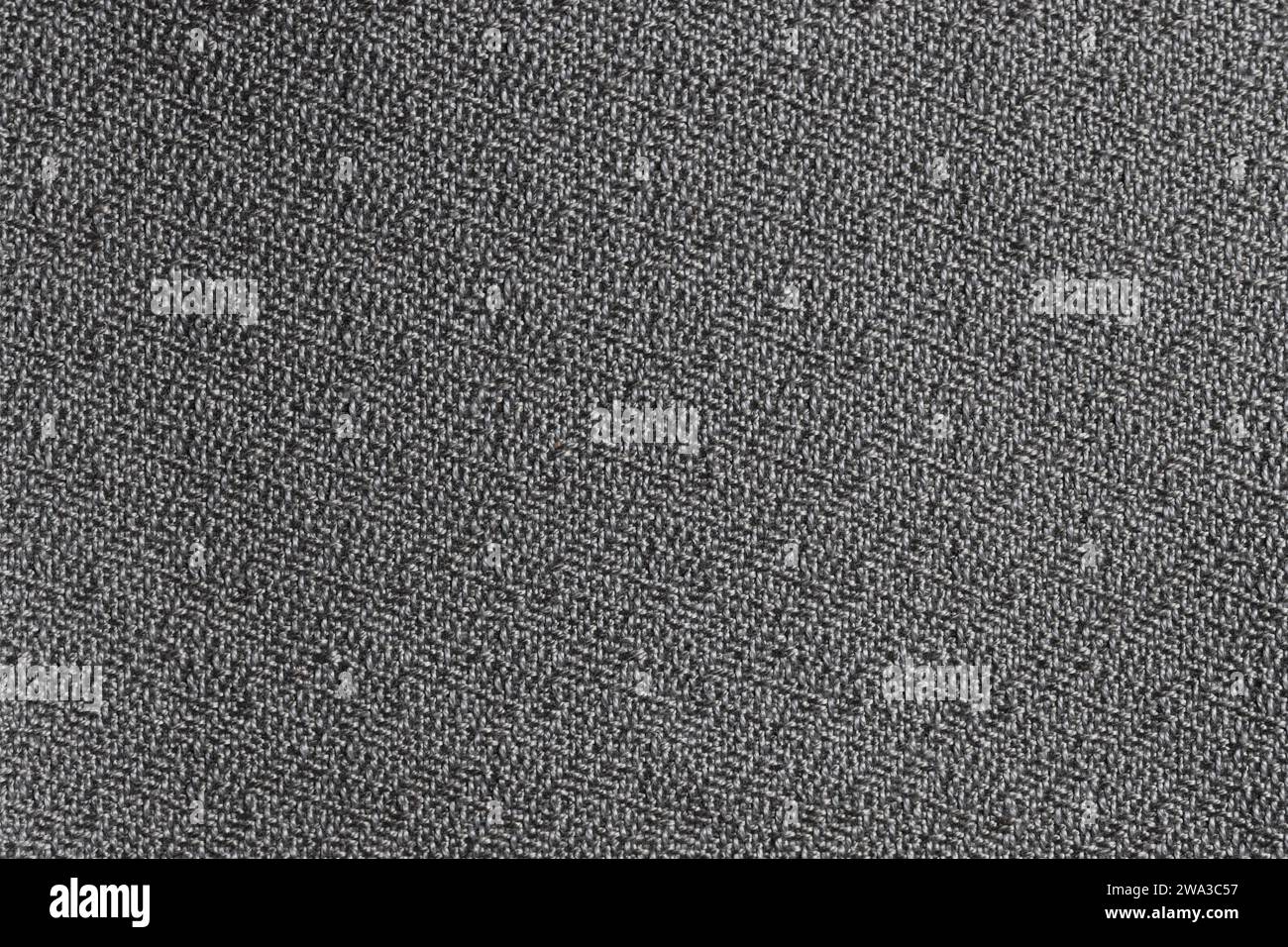 gray shiny crepe weave fabric, close up macro, shows weave and fiber ...