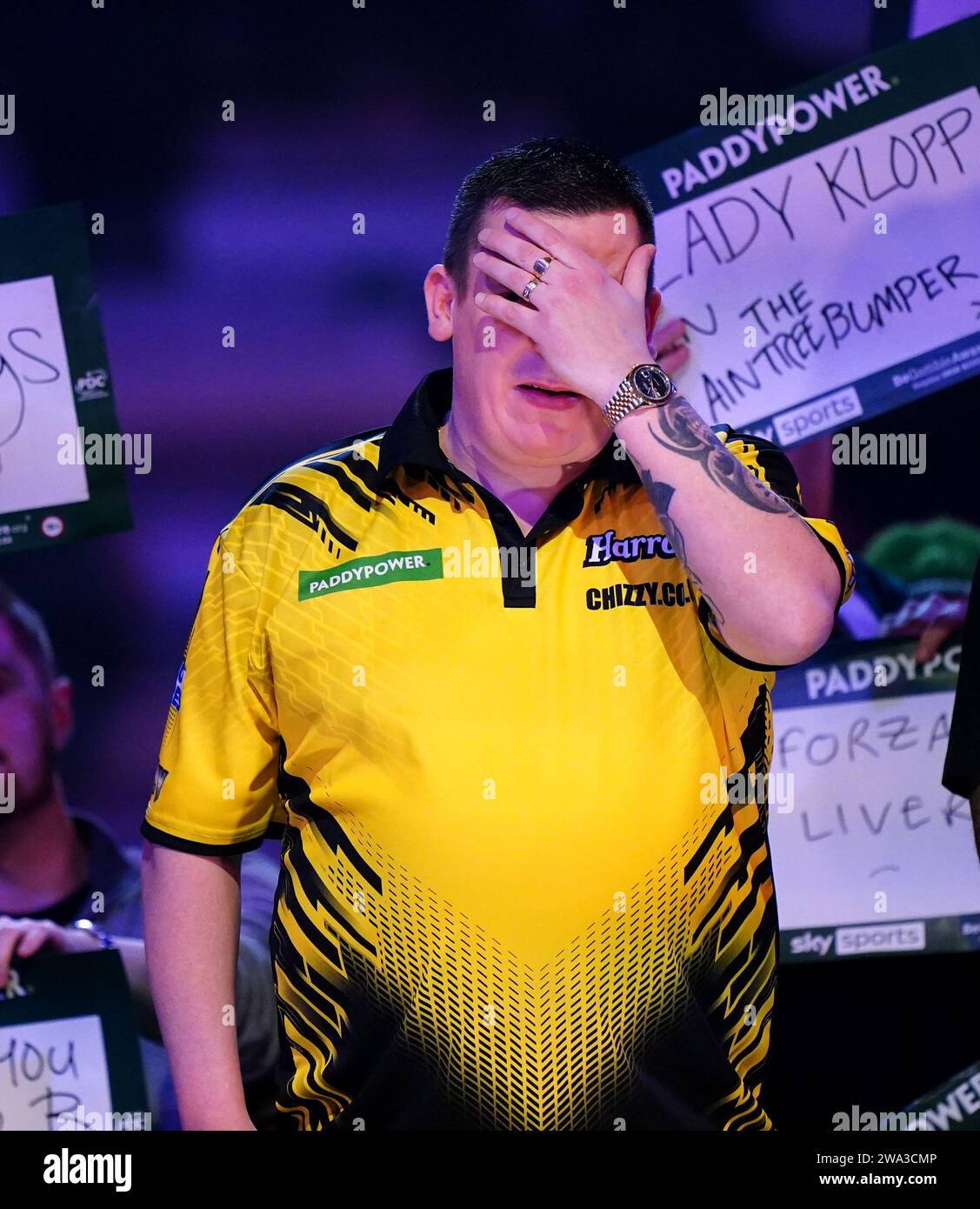 Dave Chisnall walks out to play Luke Humphries (not pictured) on day ...