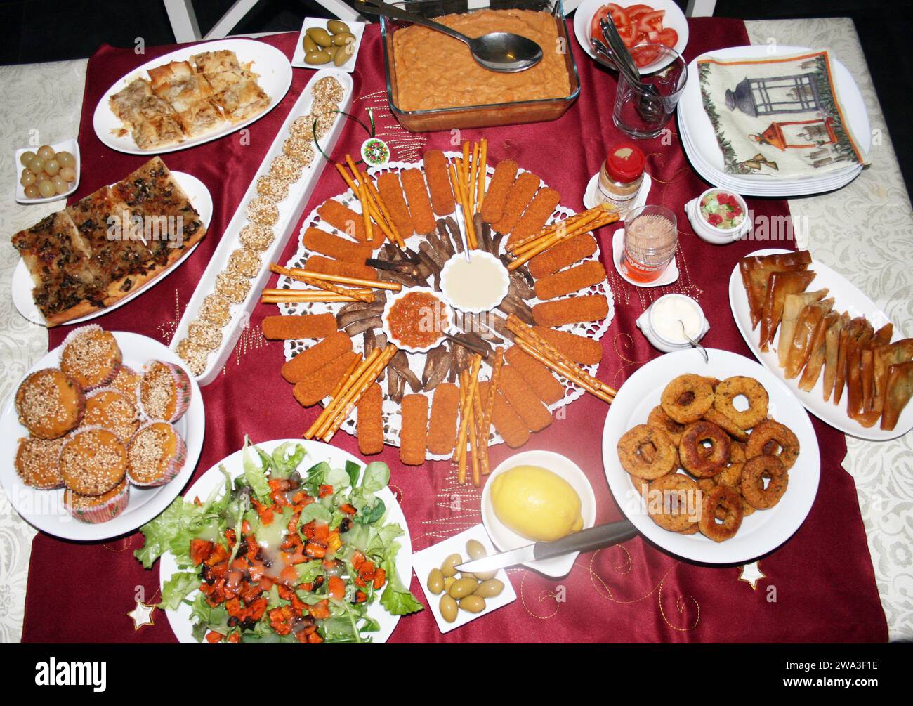 Dining table with fast food Stock Photo - Alamy