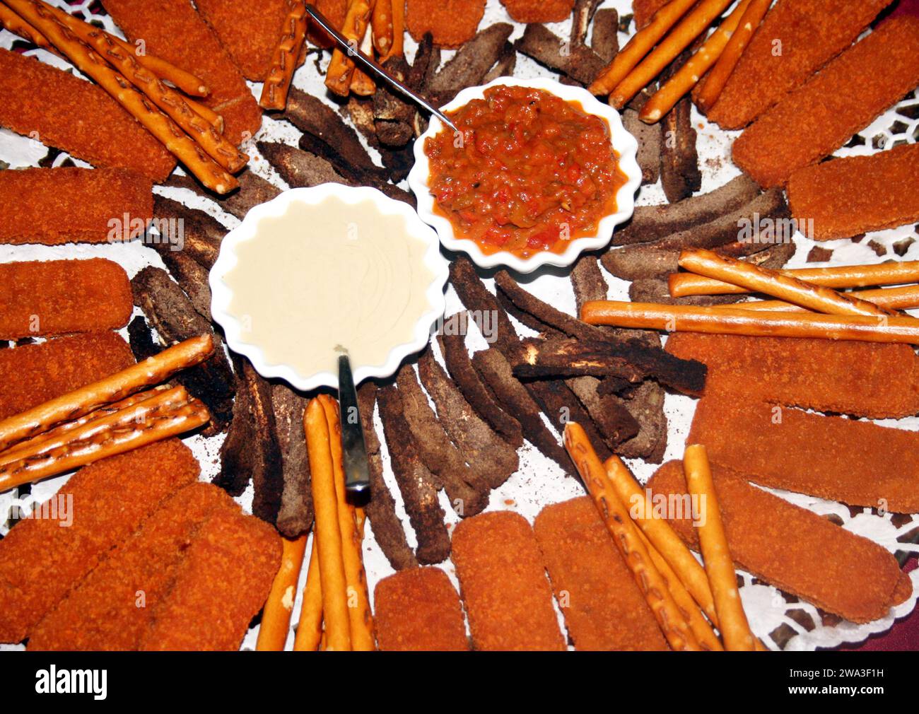 Dining table with fast food Stock Photo - Alamy
