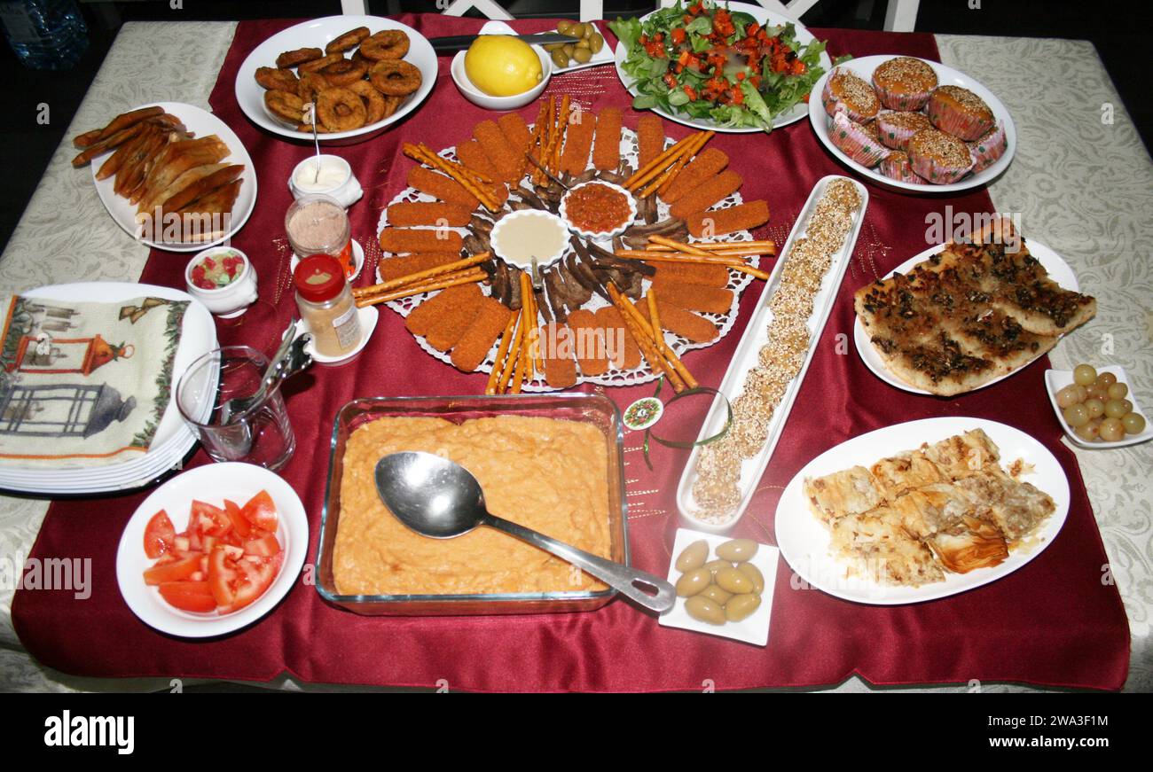 Dining table with fast food Stock Photo - Alamy