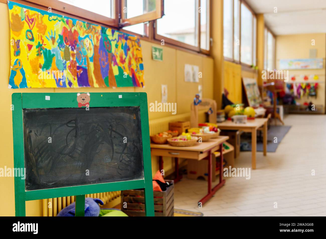 Hallway in primary school, recreation area with toys Stock Photo - Alamy