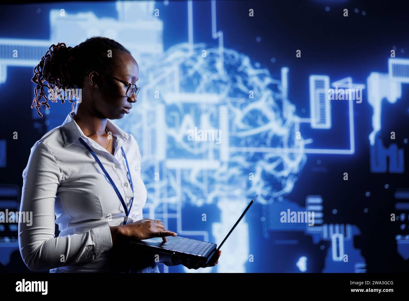 Tech Support Uses Laptop To Develop Artificial Intelligence Neural Networks Nodes Modeled After