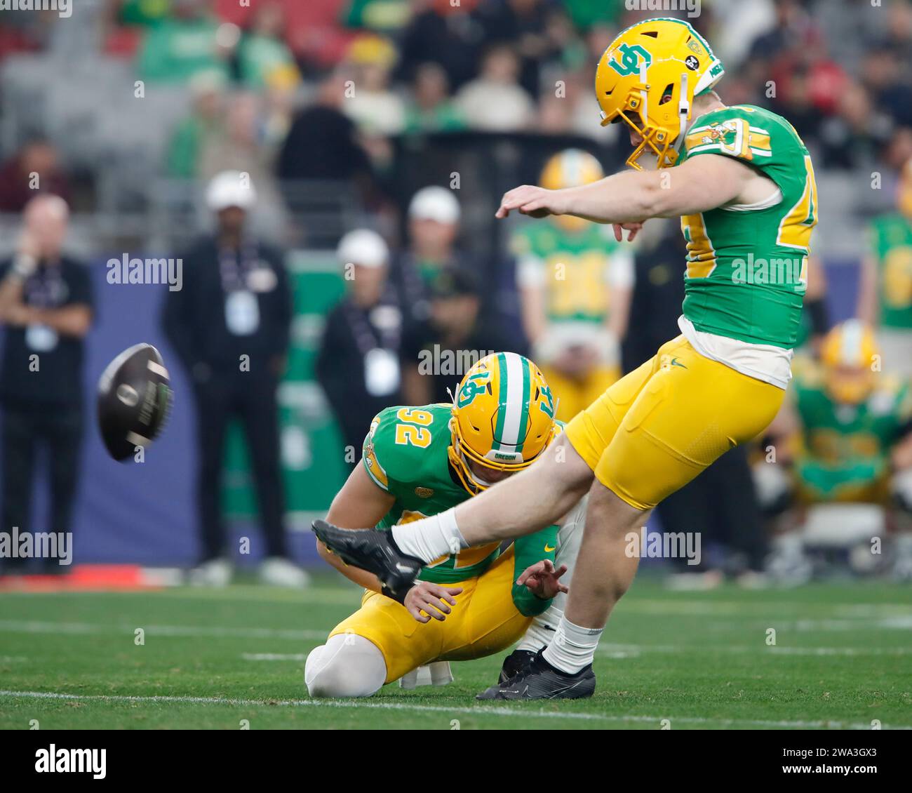 Glendale, Arizona, USA. 1st Jan, 2024. Camden Lewis (49) of the Oregon ...