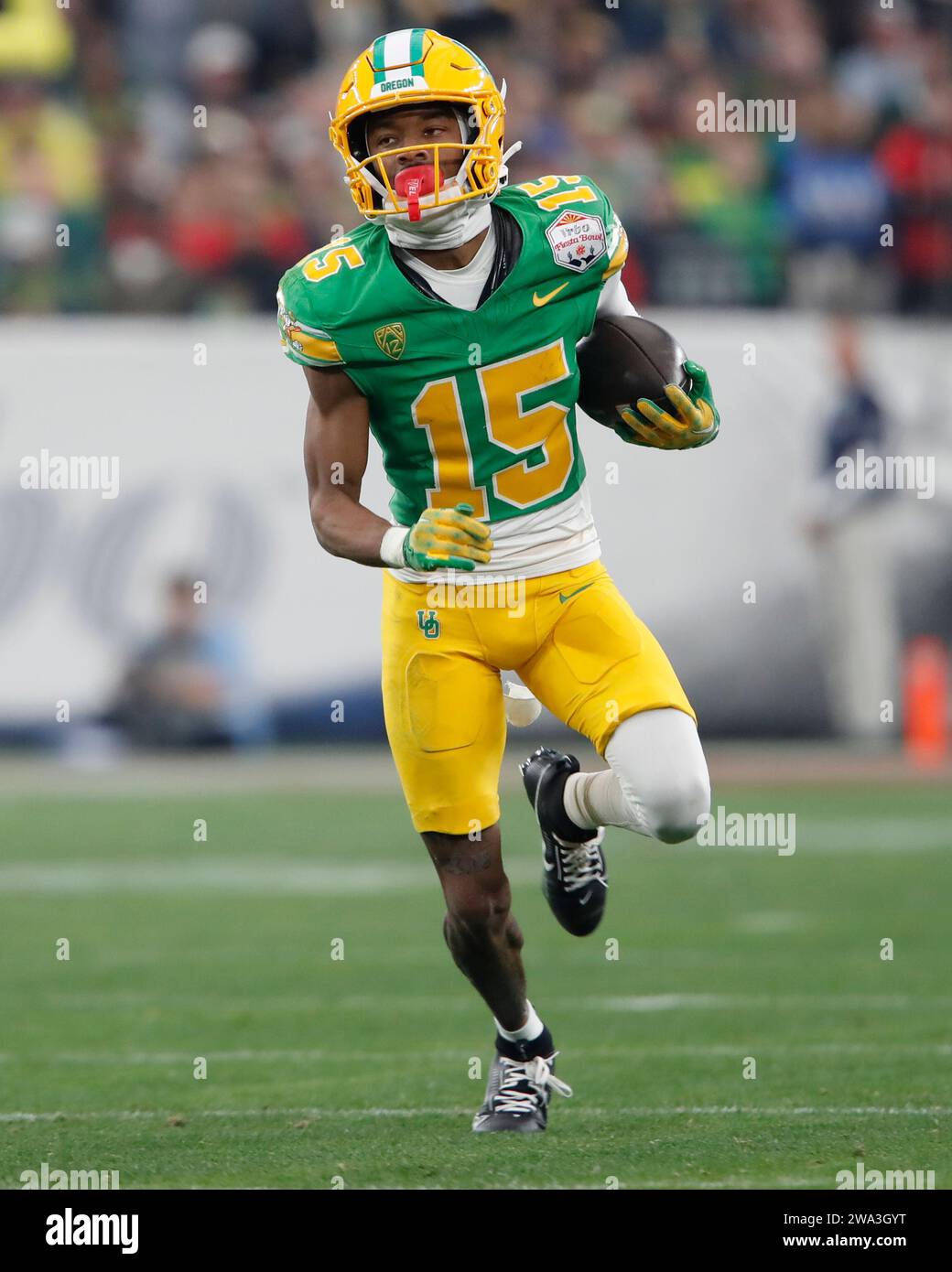 Glendale, Arizona, USA. 1st Jan, 2024. Tez Johnson (15) of the Oregon ...