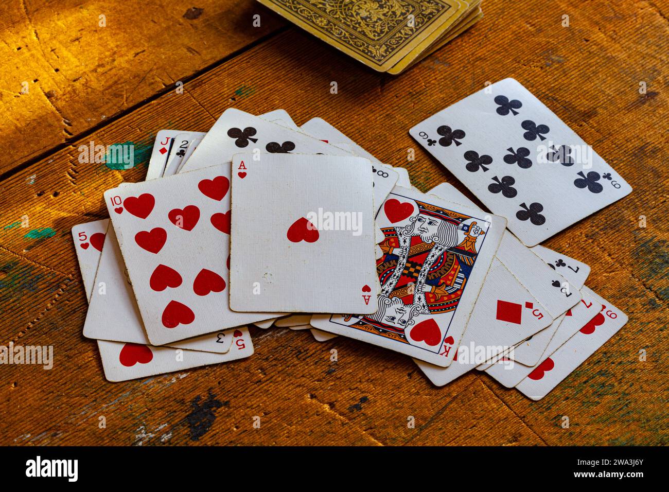 Antique playing cards on an old kitchen table at the Britannia Ship ...