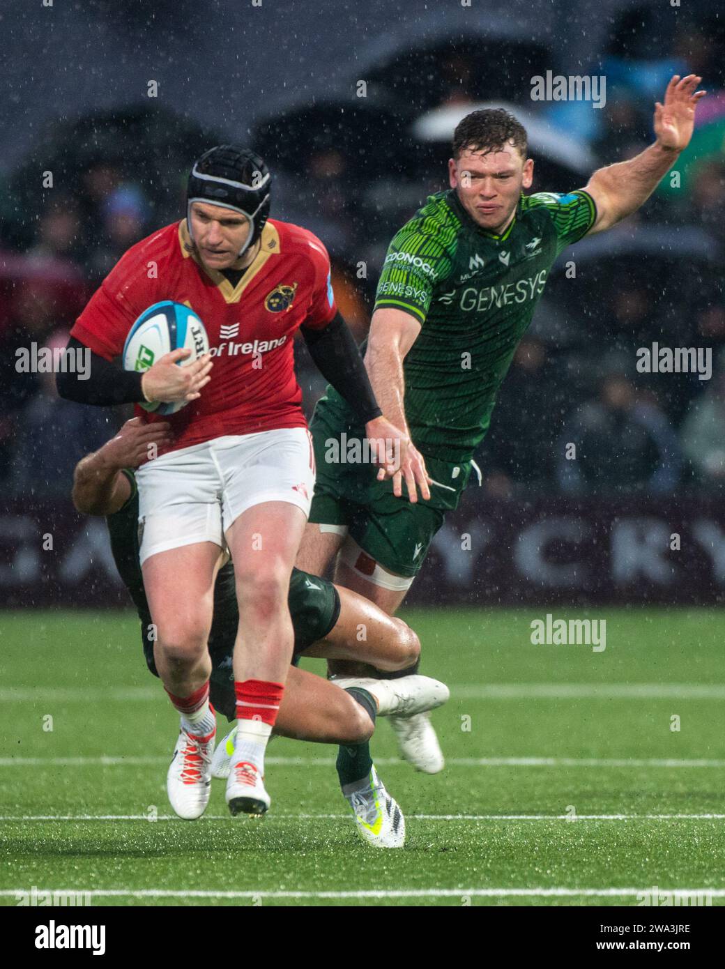 Galway, Ireland. 01st Jan, 2024. Rory Scannell of Munster tackled by ...