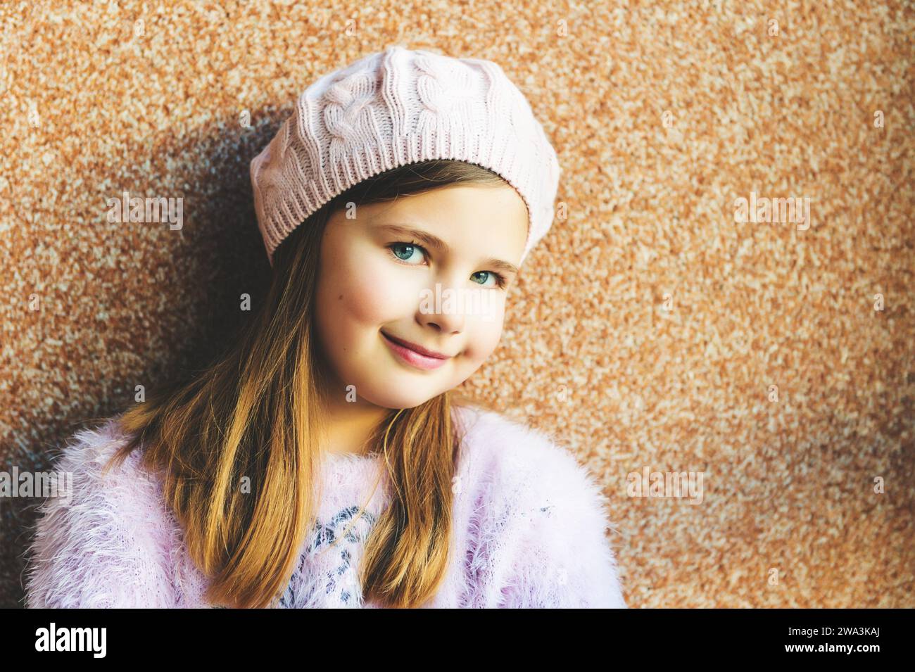 Close up portrait of cute 9 year old little girl with blue eyes ...
