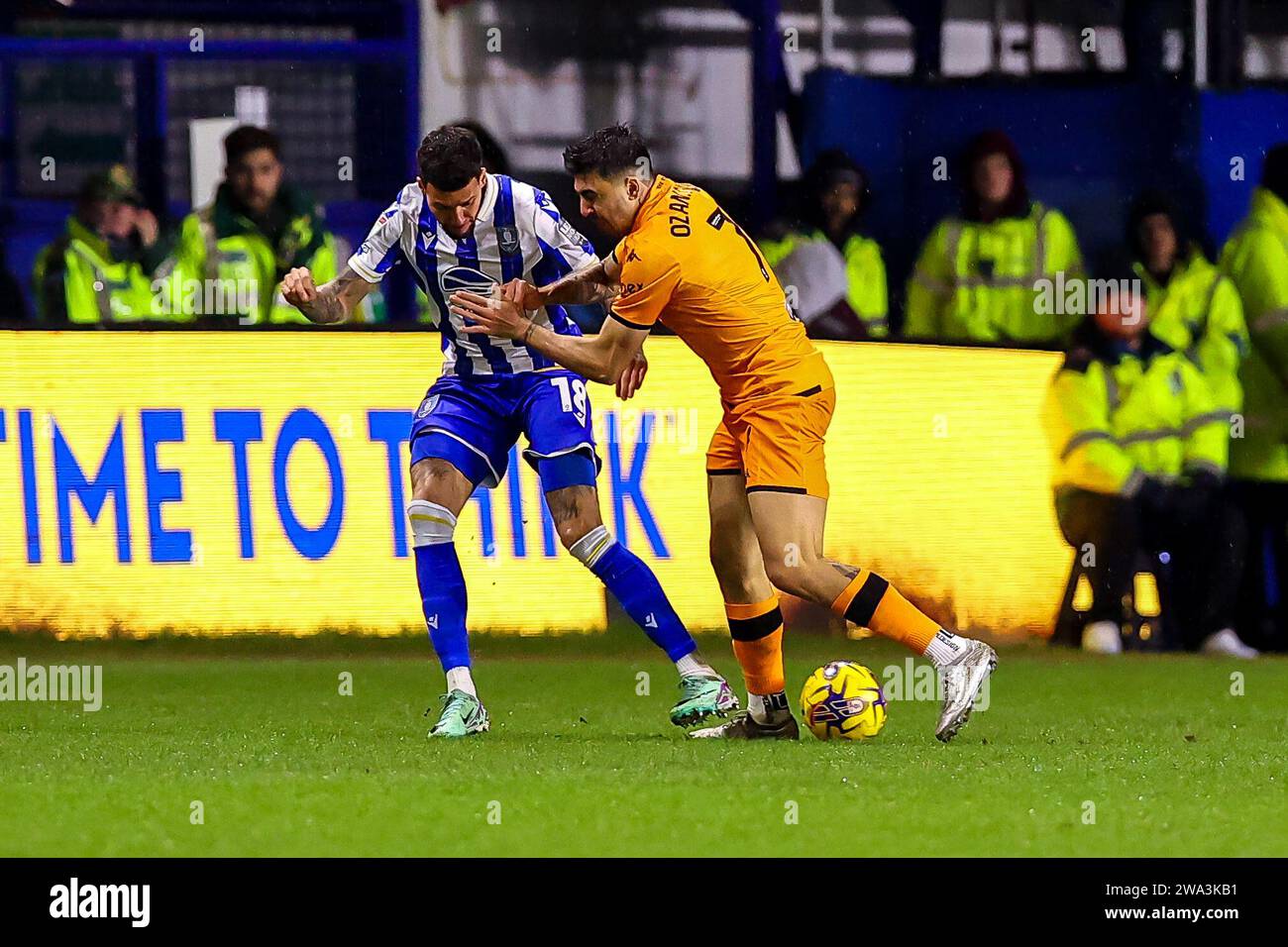 Ozan Tufan 7 of Hull City defends possession from Marvin Johnson 18 of ...