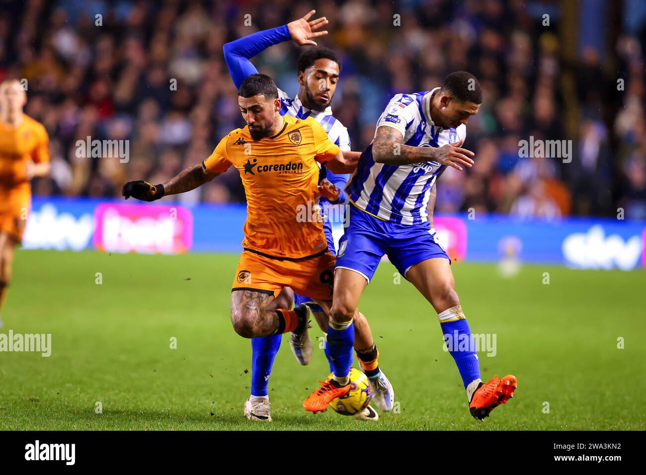 Sheffield, UK. 01st Jan, 2024. Liam Palmer 2 of Sheffield Wednesday gains possession from ...