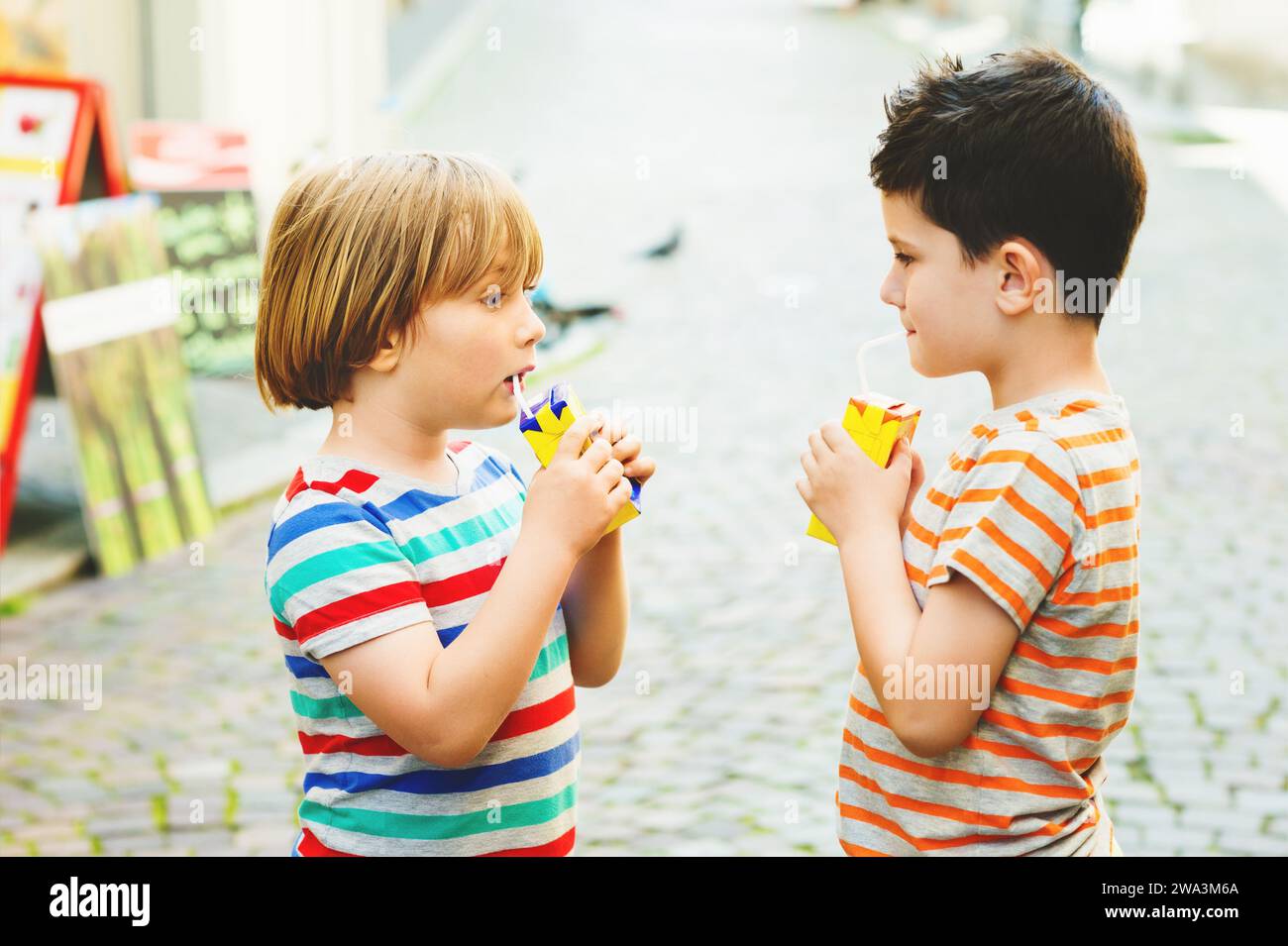 Drinking juice box hi-res stock photography and images - Alamy