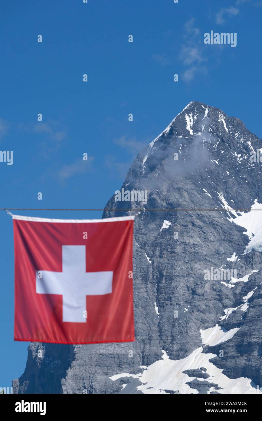 Swiss flag and the Eiger, from Murren, Bernese Oberland, Switzerland ...