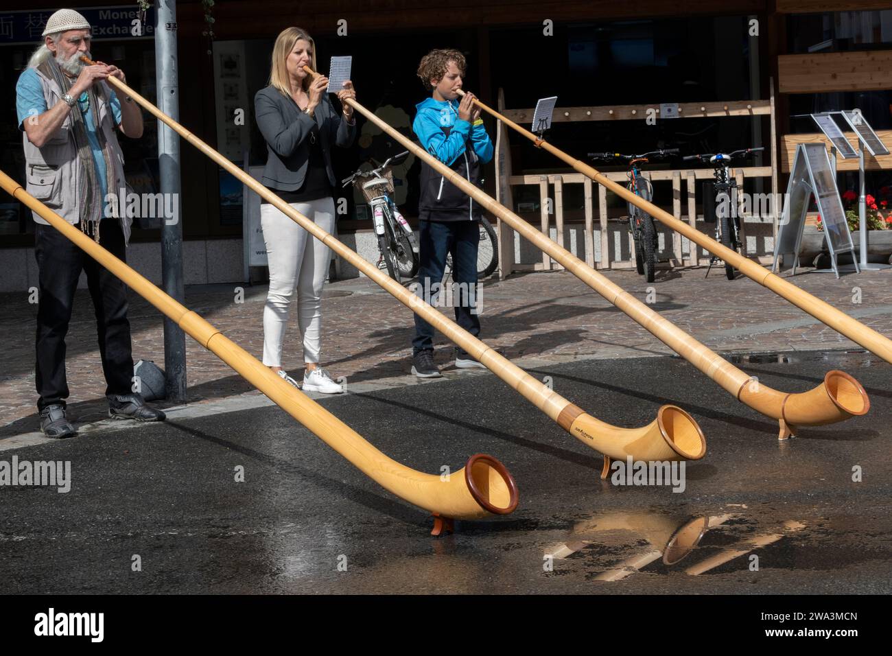 Playing their alphorns, Zermatt, Switzerland Stock Photo - Alamy