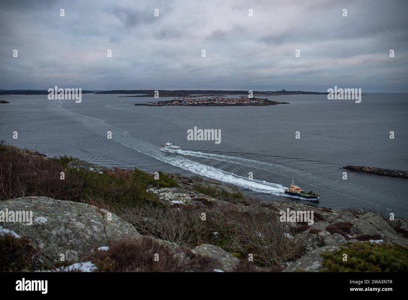 Landscape shot with a view of an island with typical Swedish houses ...