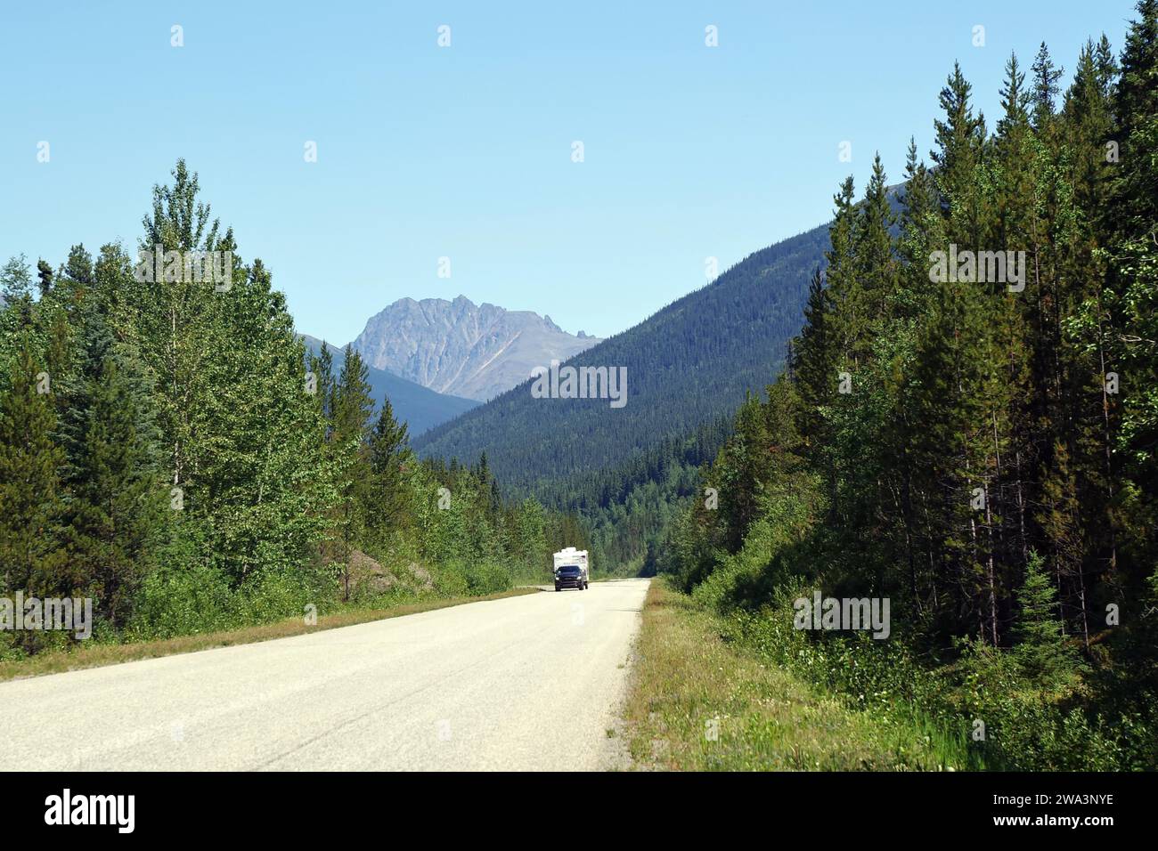 Narrow, almost traffic-free road leads through rugged mountain ...