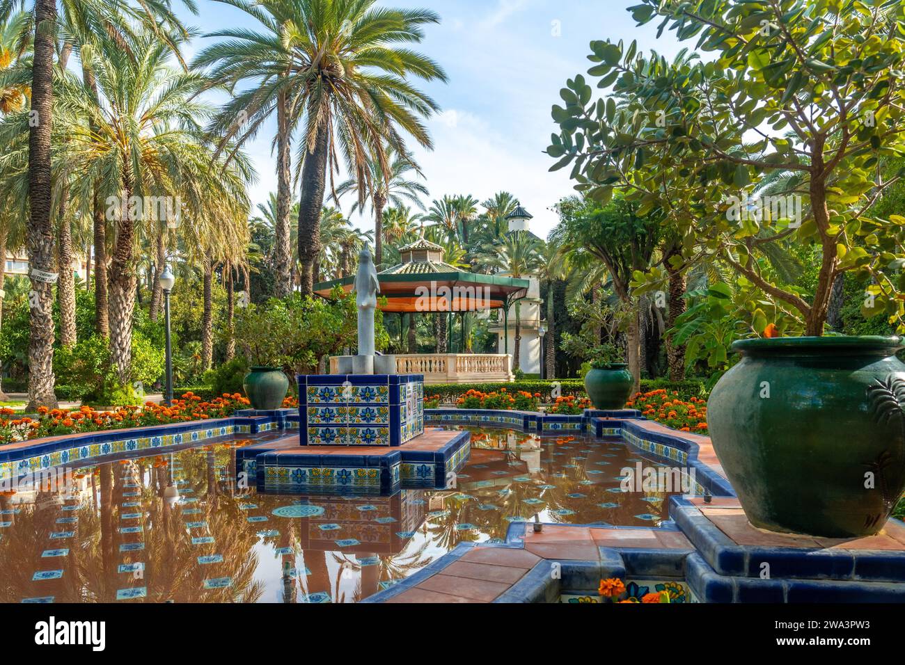Templete or pergola and the fountain in the Palmeral Park in the city ...