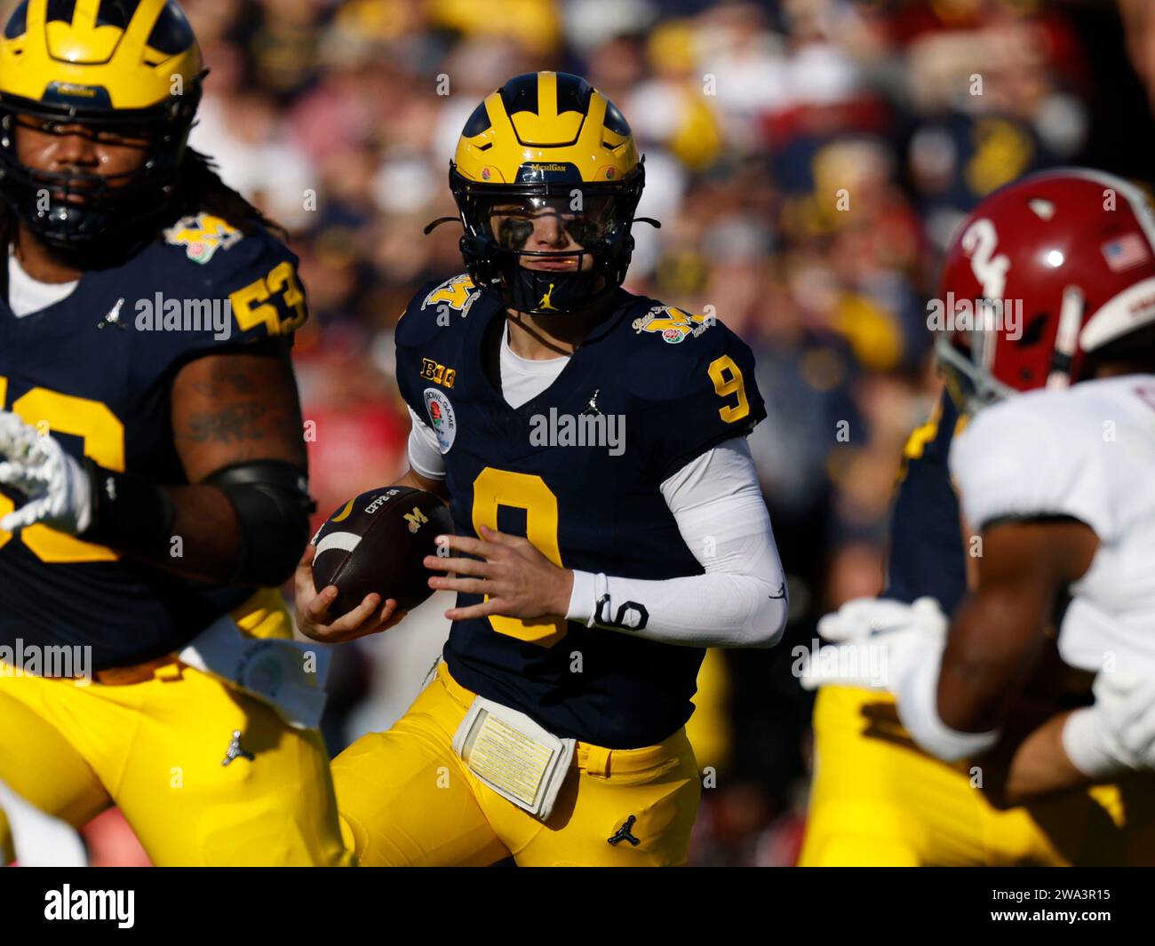 January 01, 2024 Michigan Wolverines quarterback J.J. McCarthy (9) carries the ball during the ...