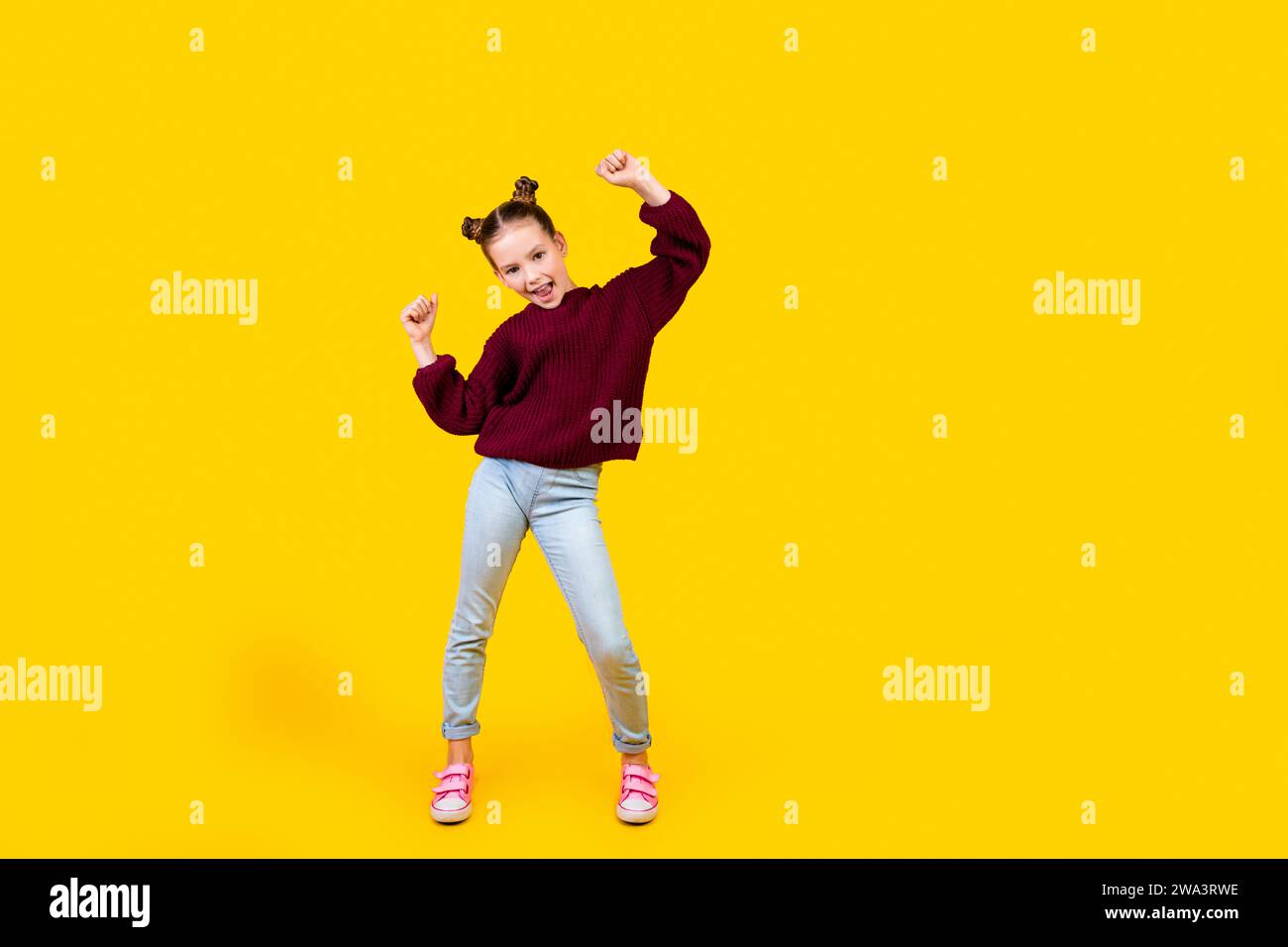 Full length portrait of cheerful little girl enjoy dancing good mood ...