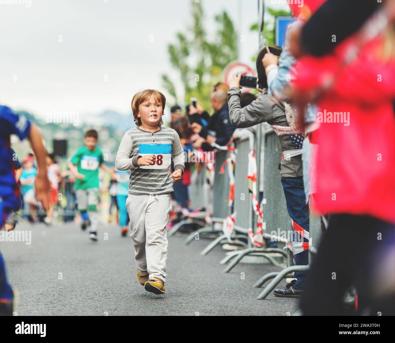 Kid run street hi-res stock photography and images - Alamy