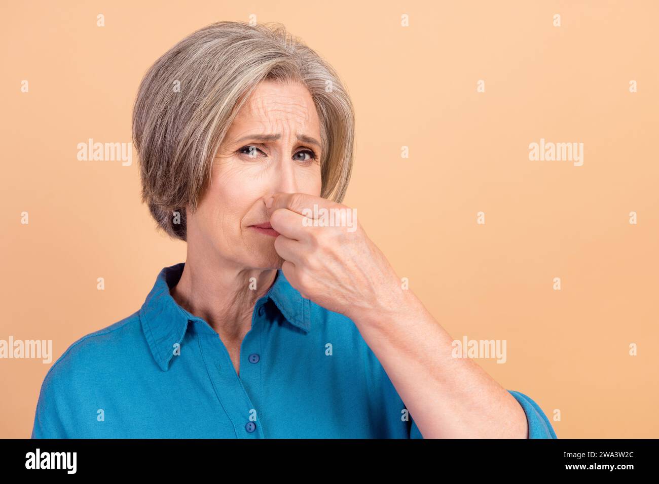 Portrait of retired person with white gray hairdo wear blue shirt ...