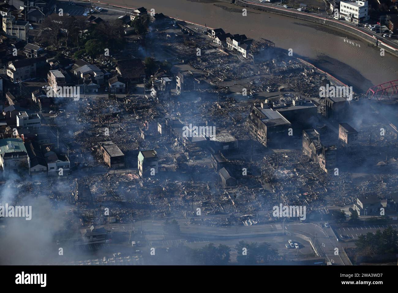 An aerial photo shows fire site in Wajima City, Ishikawa Prefecture on ...