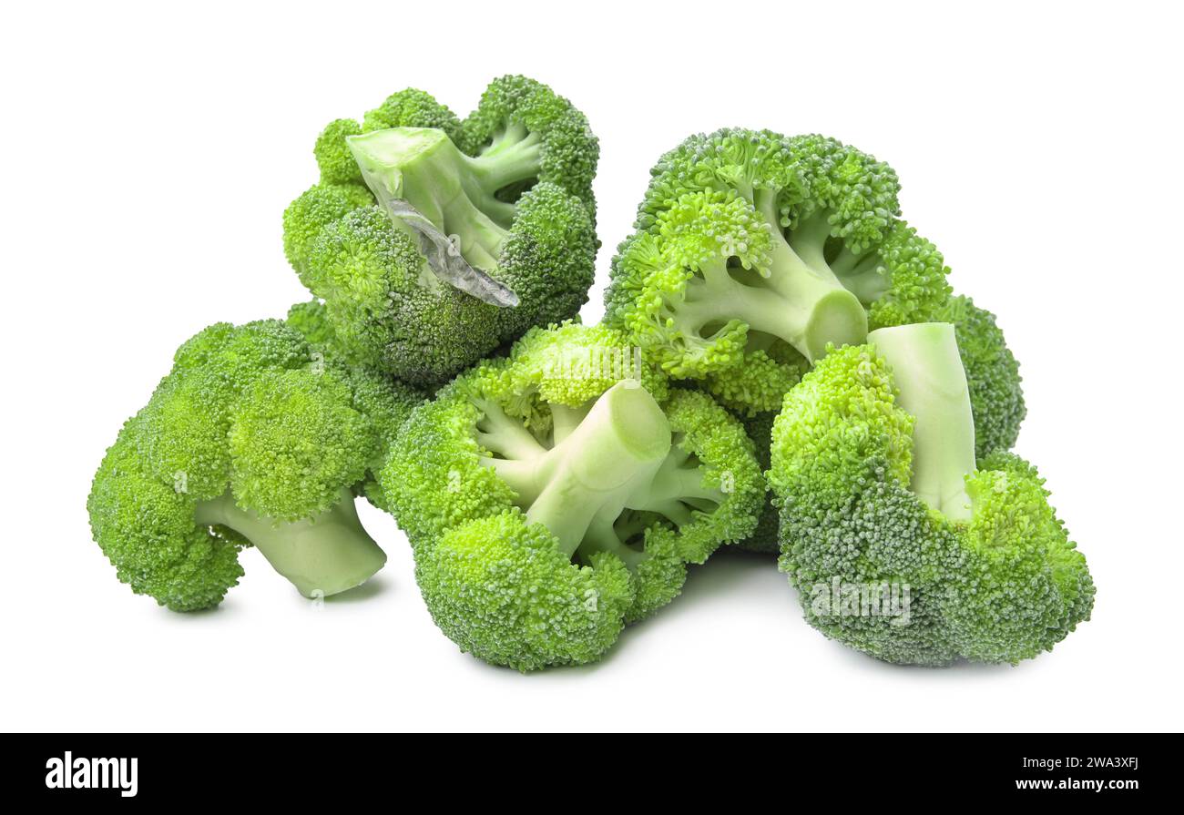 Pile of fresh raw green broccoli isolated on white Stock Photo - Alamy