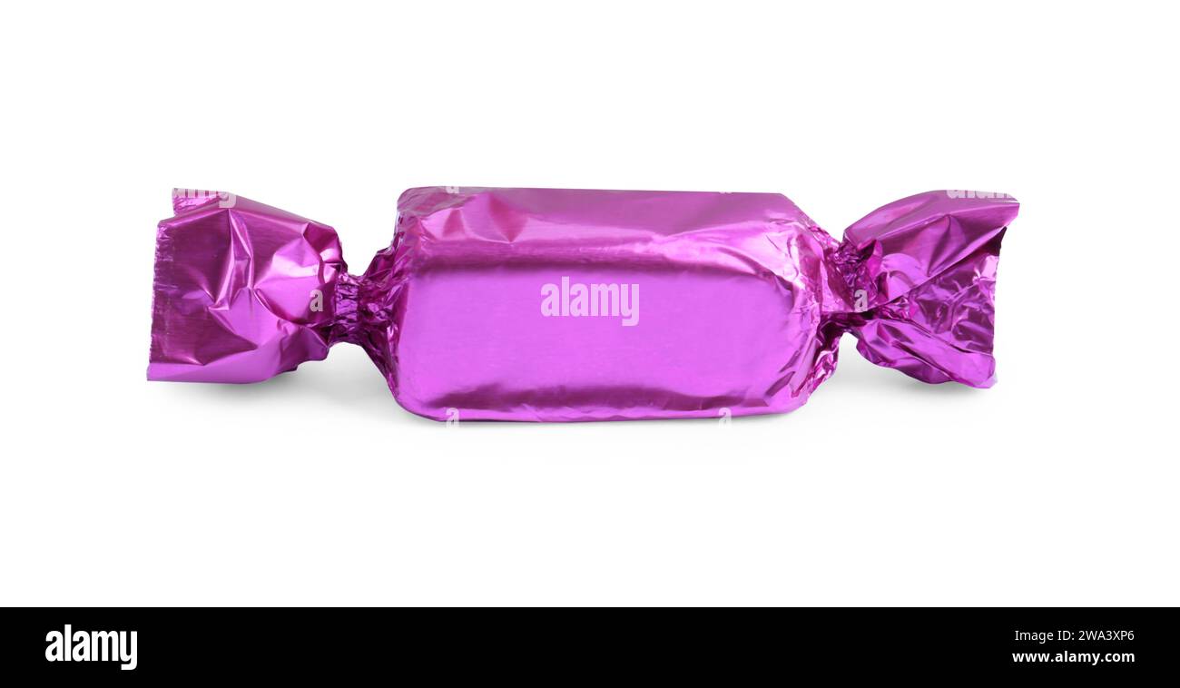 Tasty candy in violet wrapper isolated on white Stock Photo - Alamy