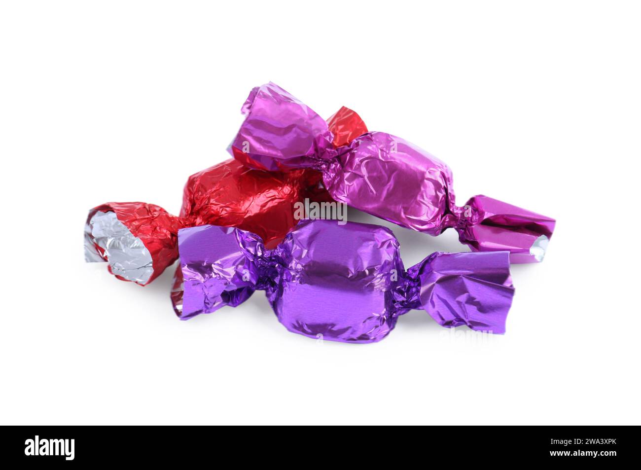 Tasty candies in colorful wrappers isolated on white Stock Photo - Alamy