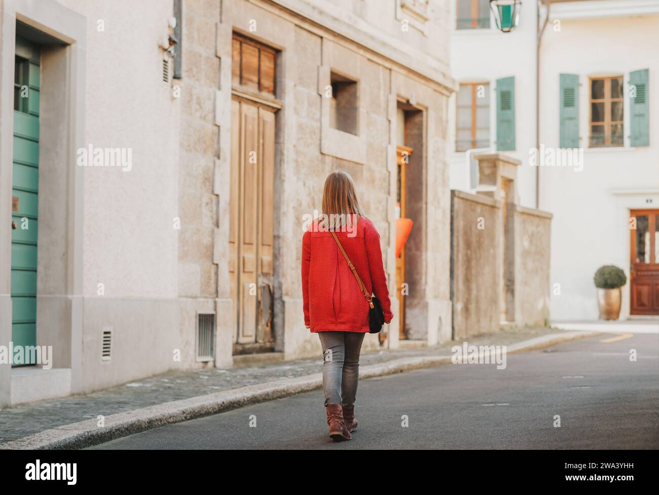 Outdoor portrait of cute teen girl wering red coat, fashion for ...