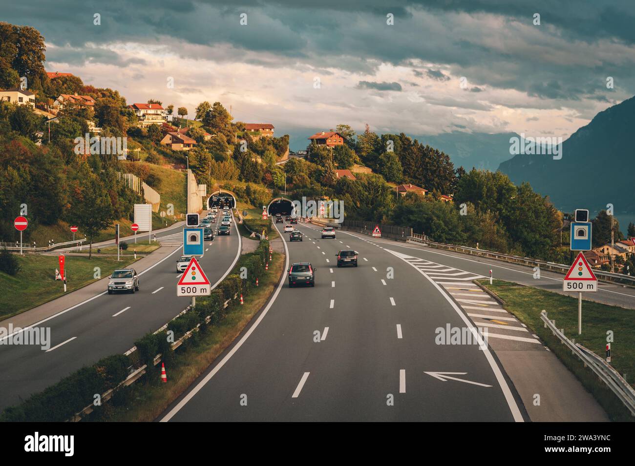 Motorway in Switzerland, road with tunnels next to lake Geneva Stock ...