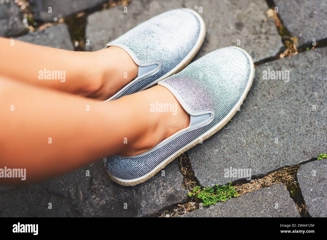 Fashion girl's silver grey skate shoes Stock Photo - Alamy