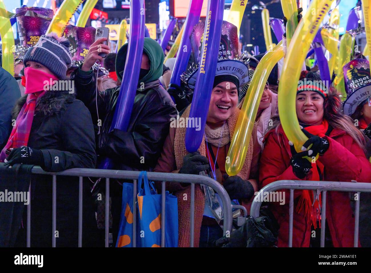 NEW YORK, N.Y. – December 31, 2023: New Year’s Eve revelers gather in ...