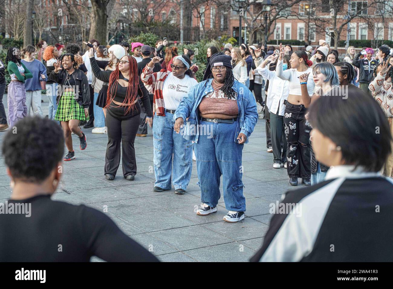 New York, USA. 28th Dec, 2023. People watch the students dance in the ...