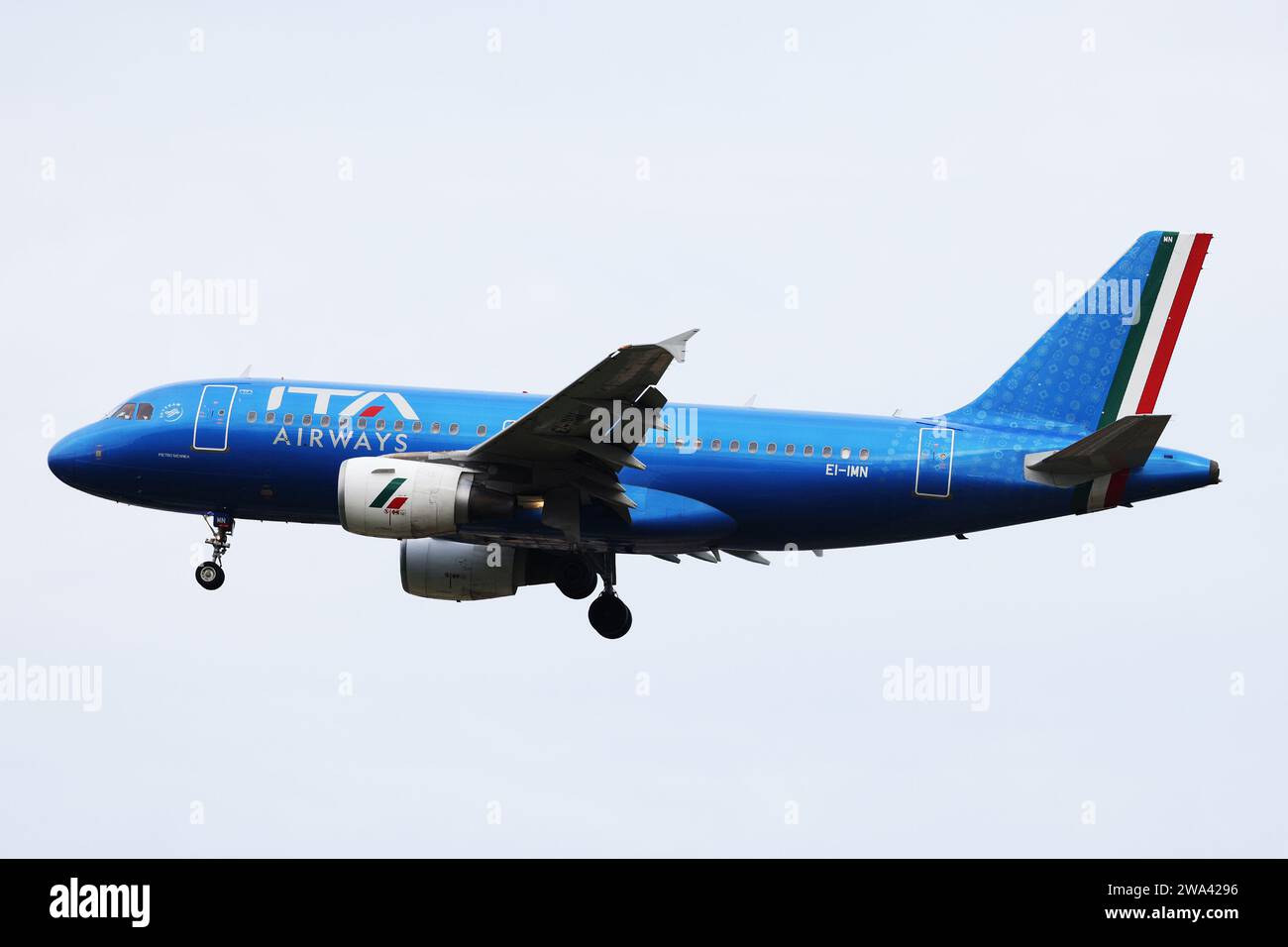 in the photo an A319-111 airbus of the Ita Airways company with livery ...