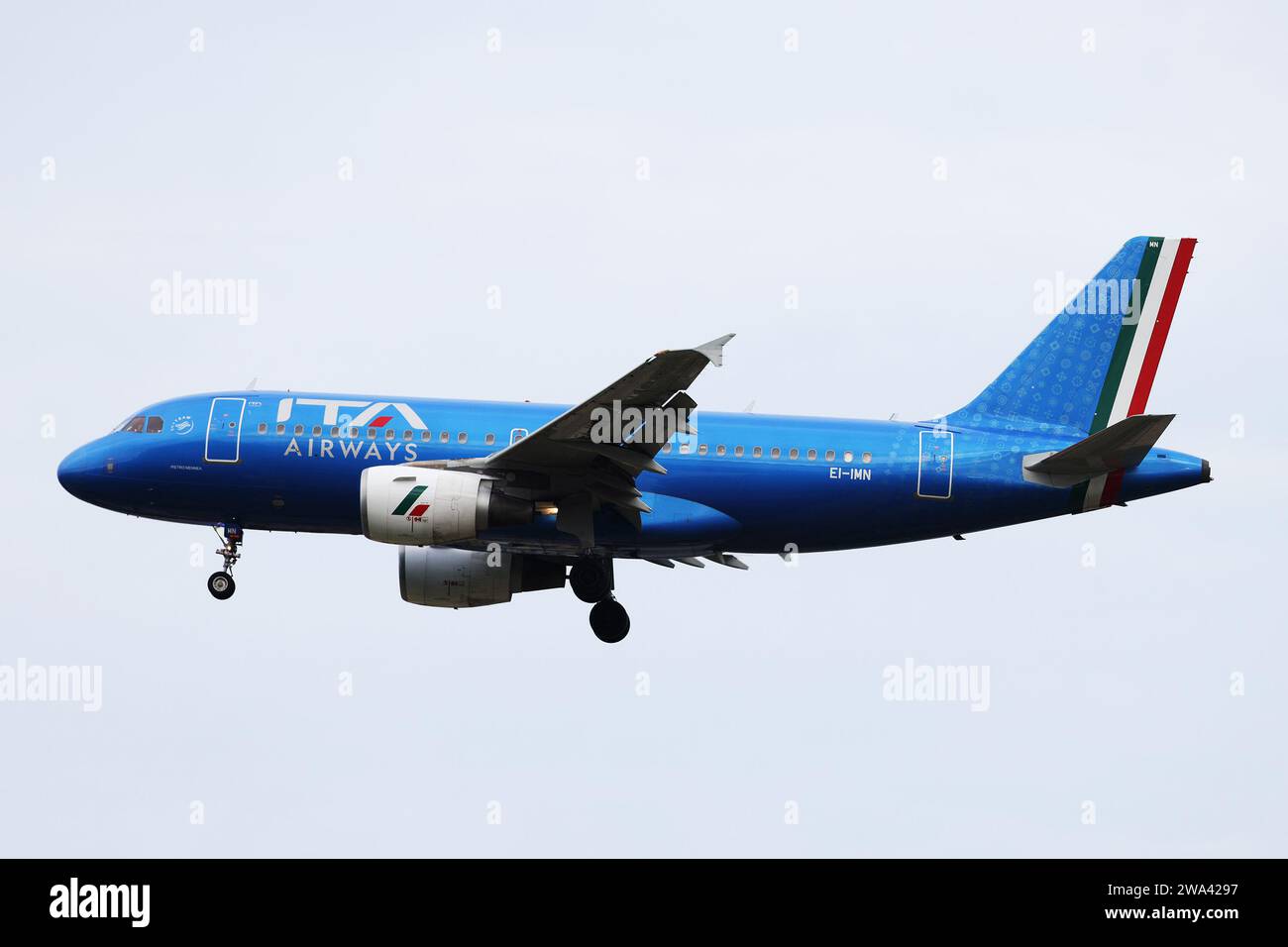 in the photo an A319-111 airbus of the Ita Airways company with livery ...