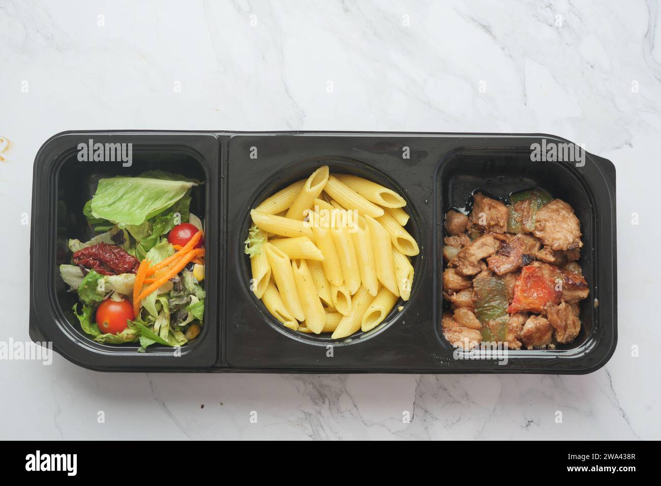 Pasta salad in plastic container hi-res stock photography and images ...