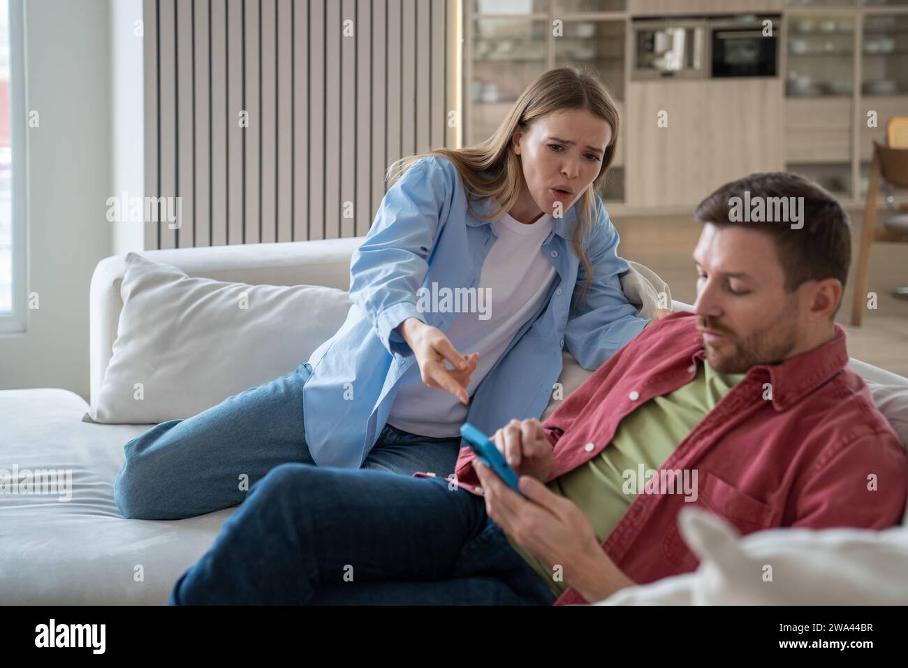 Worried woman suspects husband of cheating asks to see messages on ...