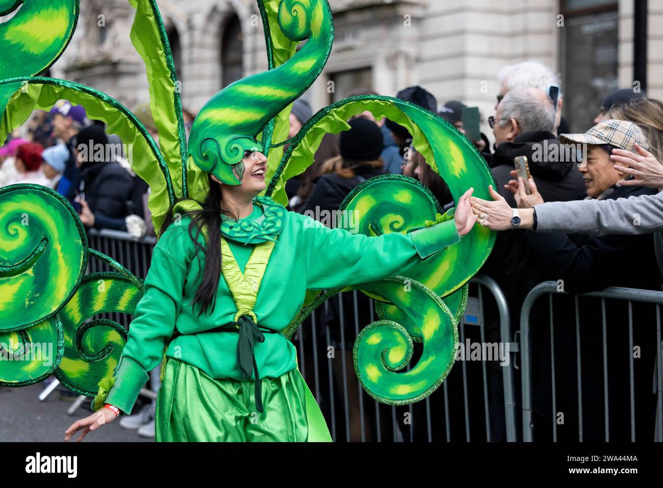 London, UK. 01st Jan, 2024. Performers seen interacting with the crowds during the London New ...