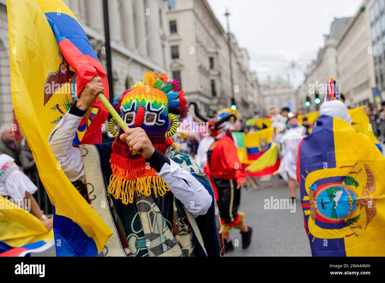 London, UK. 01st Jan, 2024. A performer seen in traditional indigenous costume during the London ...