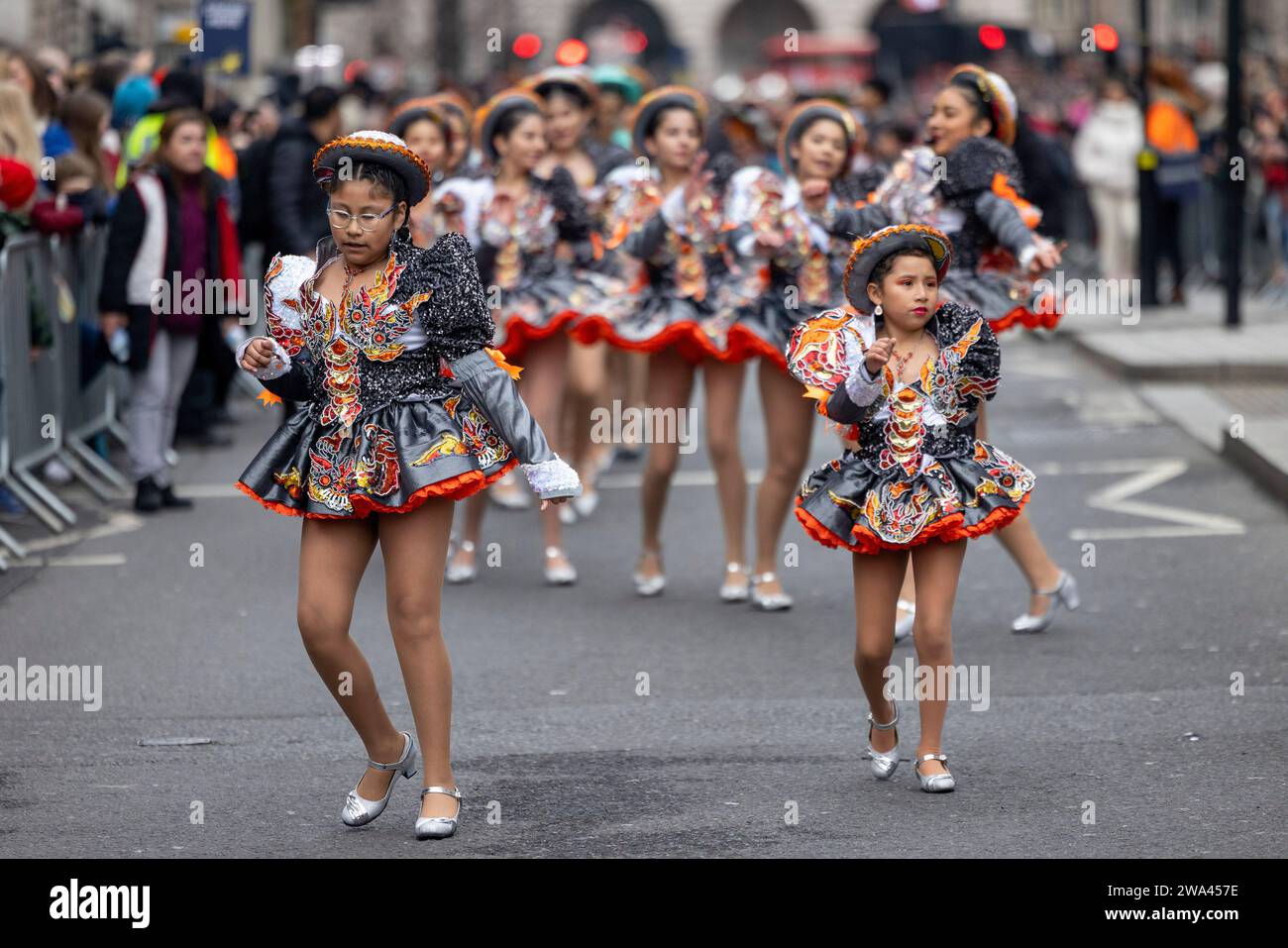 London, UK. 01st Jan, 2024. Performers seen dancing during the London New Year's Day parade. The ...