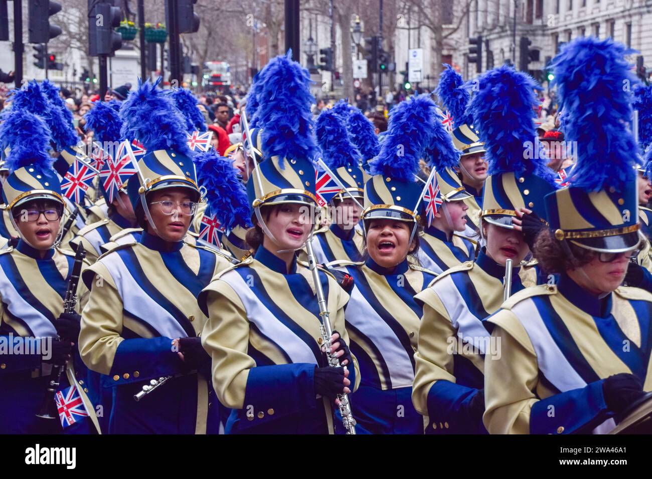 London, UK. 01st Jan, 2024. A marching band passes through Trafalgar Square during the London's ...