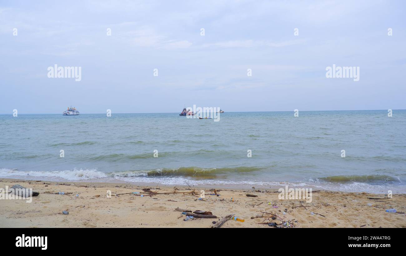 Natural View Of A Tropical Beach With Calm Sea Waves, Tanjung Kalian ...